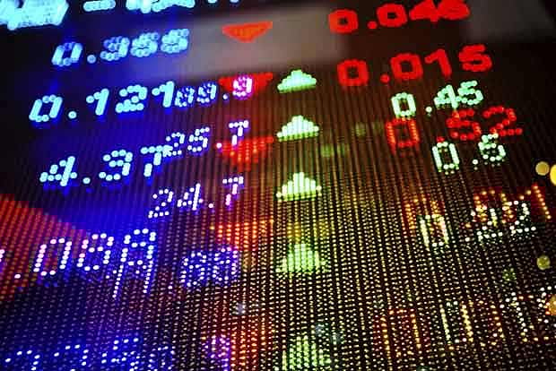 Wall Street slips off record highs, Tesla drops after fatal crash