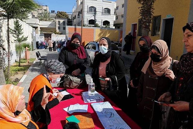 Palestinians open election registration offices in West Bank and Gaza