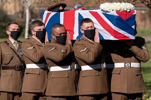 Military honors and fly-past mark funeral of Britain's Captain Tom