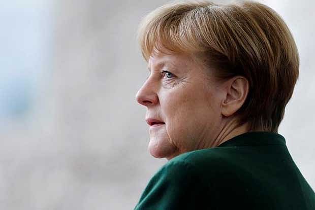 Neck rubs, tapped phones: Merkel has history with US leaders