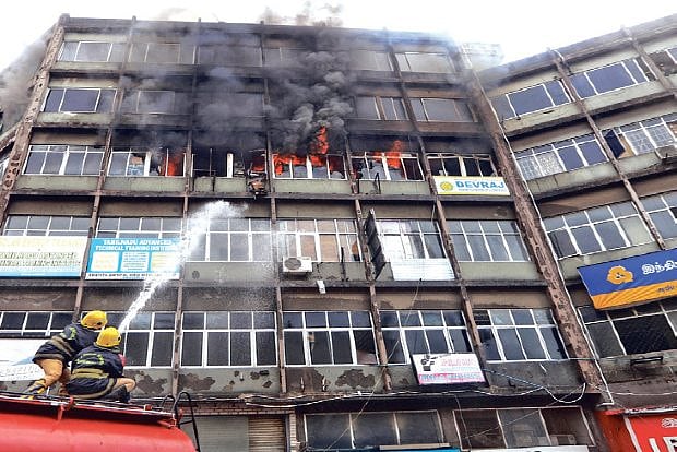 Narrow escape for 30 after fire at complex on Anna Salai