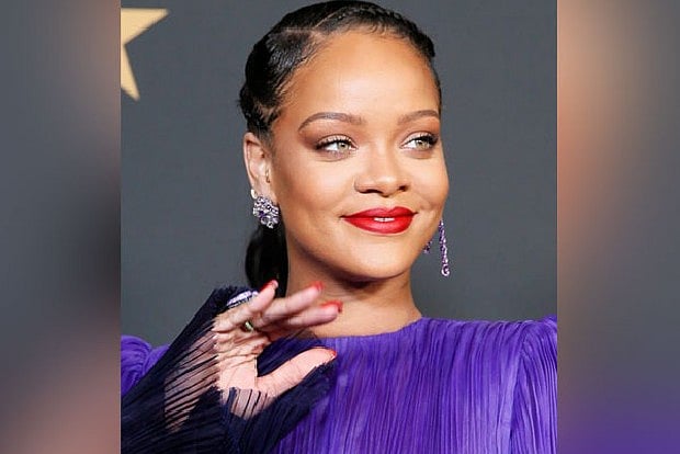 Rihanna flaunts baby bump in first Instagram post after pregnancy ...