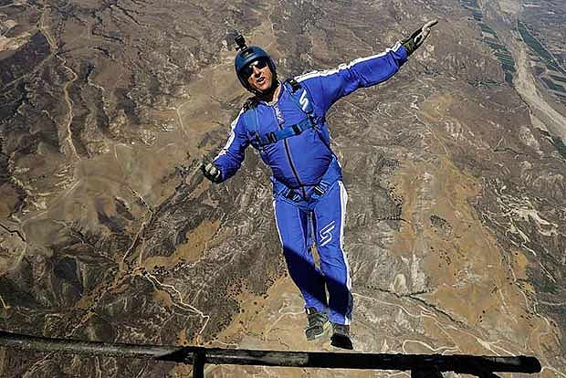 Skydiver jumps, lands without chute