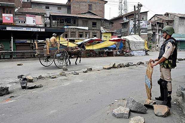 Life remains paralysed in Kashmir, restrictions continue