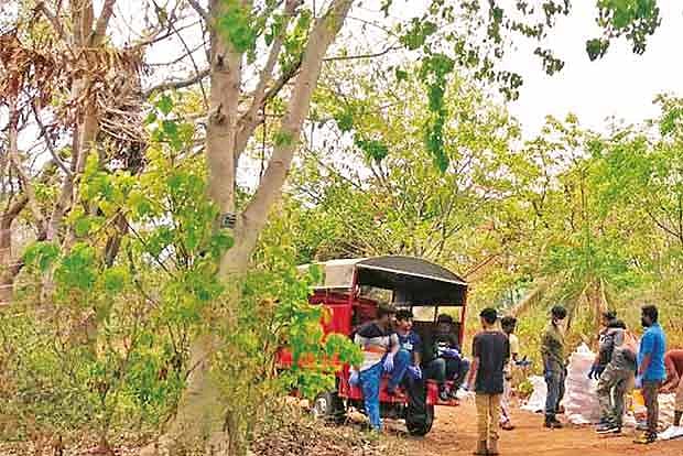 Volunteers, Forest department clear garbage in Nanmangalam Reserve Forest
