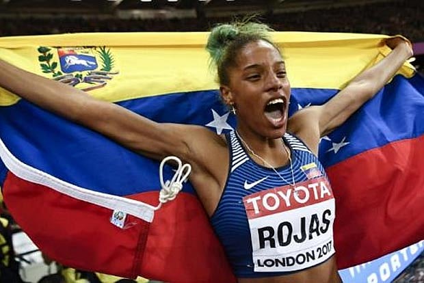 Rojas wins triple jump to claim Venezuela's first world title