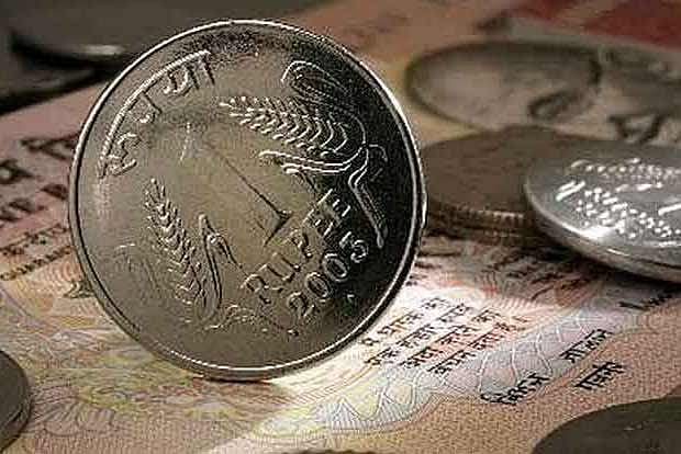 Rupee off 1-month high, drops 15 paise to 63.93 vs USD
