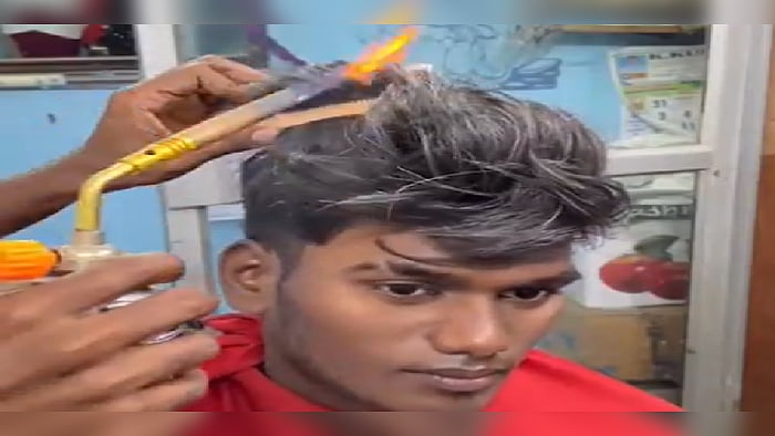 Viral Video,আগুনে পুড়িয়ে চুল কাটলেন নাপিত! ভিডিয়ো দেখে অবাক নেটপাড়া ...