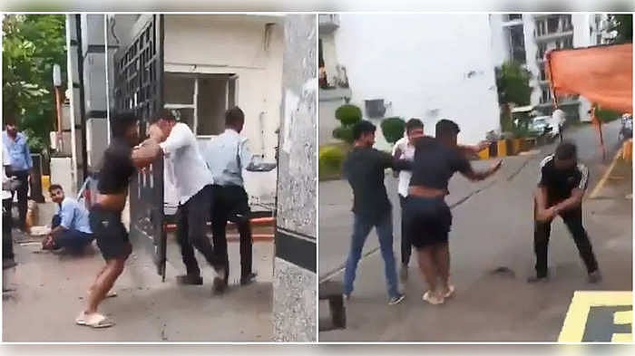 পার্কিংয়ের জায়গা নিয়ে হাতাহাতি দুই ব্যক্তির, দাঁড়িয়ে 'মজা' দেখলেন ...