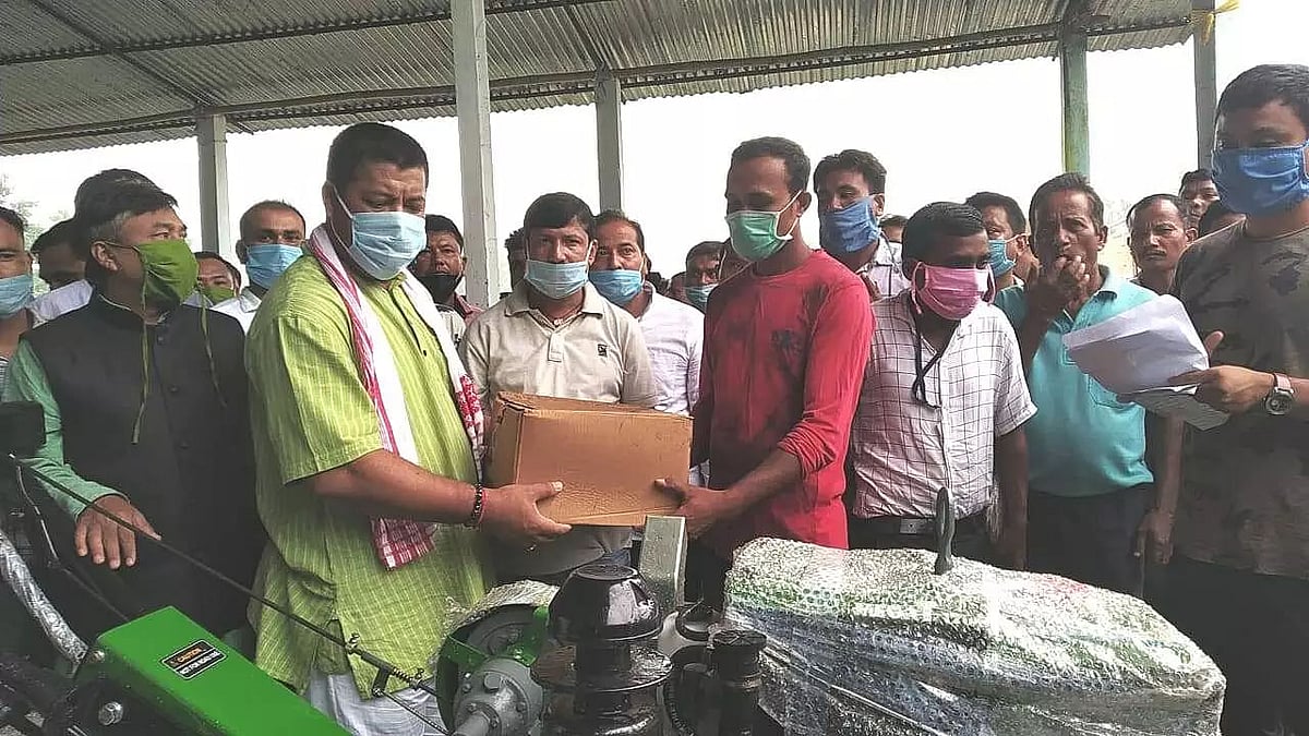 Chairman of Assam Gas Company Bolin Chetia distributed power tillers
