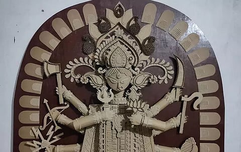 Idol of Goddess Durga crafted with waste cartons by Dhubri girl