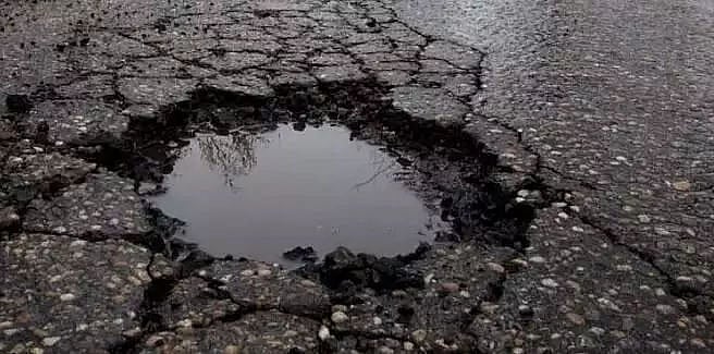 Locals demand repair of dilapidated road in Demow