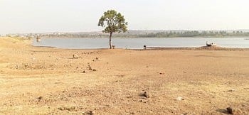 गळती व बेसुमार पाणी उपशामुळे कळंबा तलावाची पाणी पातळी 19 फुटावर