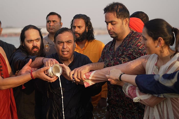 Mukesh Ambani & family take holy dip at Maha Kumbh 2025 in Prayagraj ...