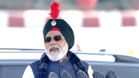 Delhi: PM Modi wears turban with a red badge hackle while addressing in ...