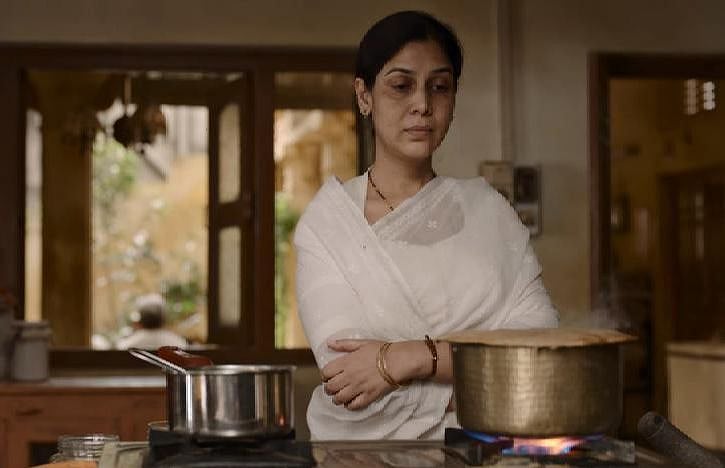 Scene from Netflix's 'Mai' depicting how women work even amidst grief ...