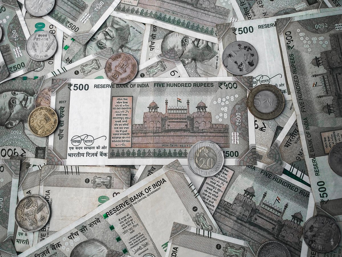 Rupee gains 26 paise to 81.67 against US dollar