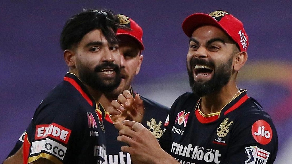 WATCH: RCB stars pay a special visit to Mohammed Siraj's new home in ...