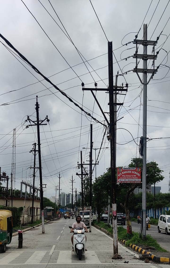 Traffic Hazard: Road Broadened, But Poles Not Removed