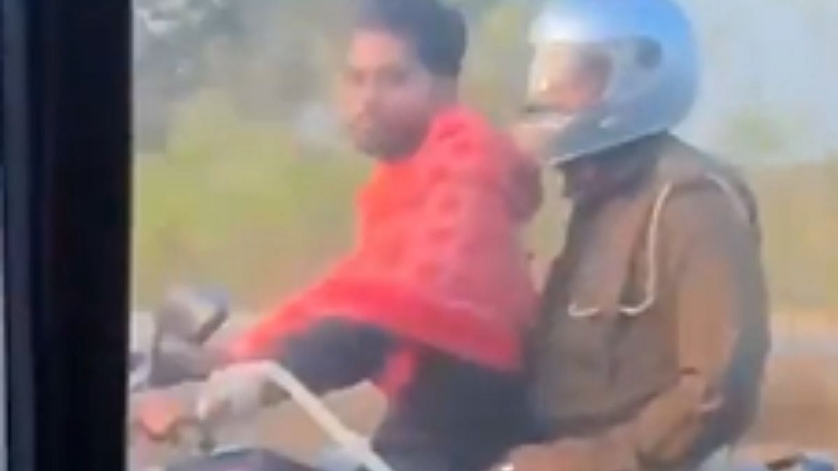 Rope-Tied Helmetless Criminal Rides Bike As UP Cop Sits Behind In ...