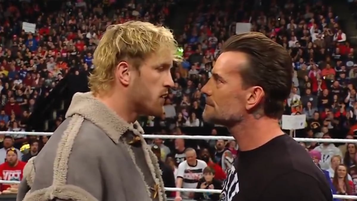 WWE RAW: Logan Paul Escapes Ring After Slapping CM Punk, Tension Builds ...