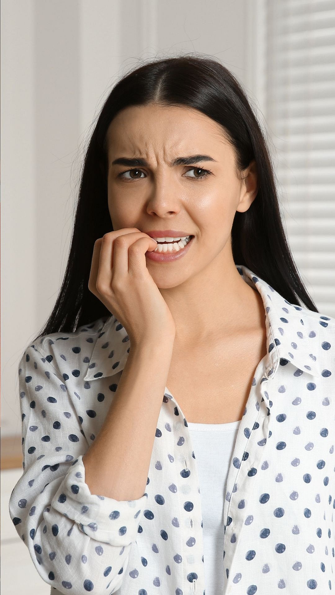 Biting Your Nails? Here's How It's Secretly Harming Your Health