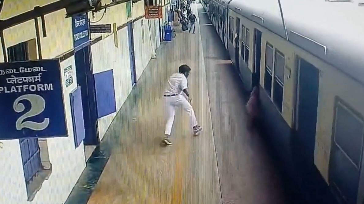 Woman Slips While Boarding Moving Train, Ticket Checker Saves Her From ...