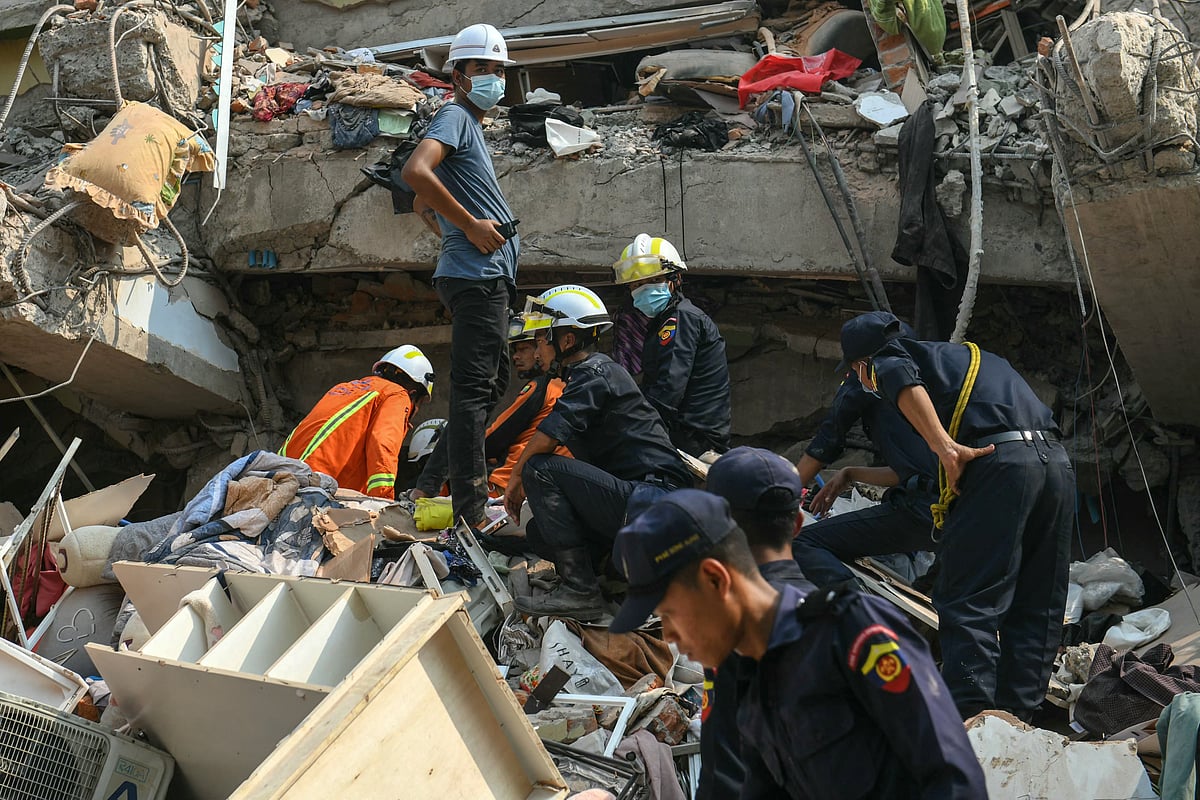 More than 90 feared trapped in quake-hit Myanmar apartment block