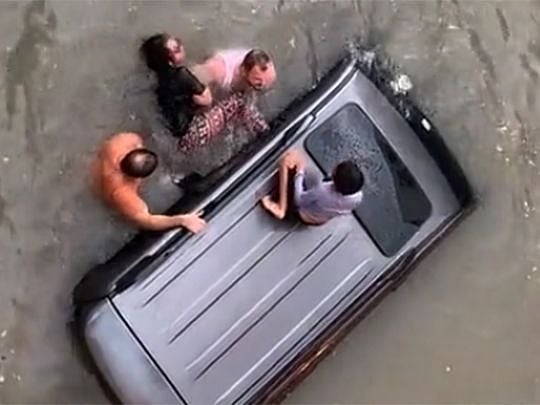 Watch: Dubai banker who saved family of three from sinking car in ...