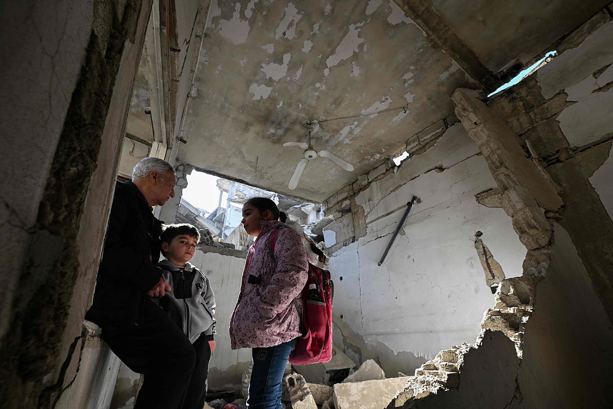Syrians return to homes devastated by war