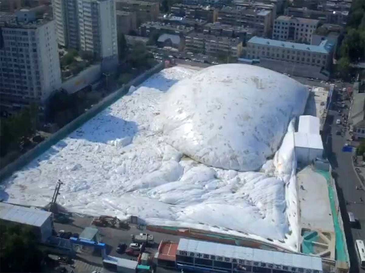 Video: China's innovative inflatable dome reduces construction dust and ...