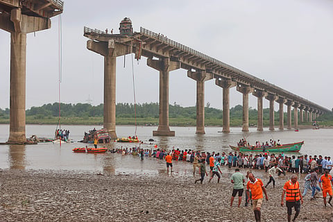 Gujarat bridge collapse: 13 dead as multiple vehicles fall into ...