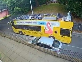 Greater Manchester bus crash rips off roof, driver arrested after 20 ...