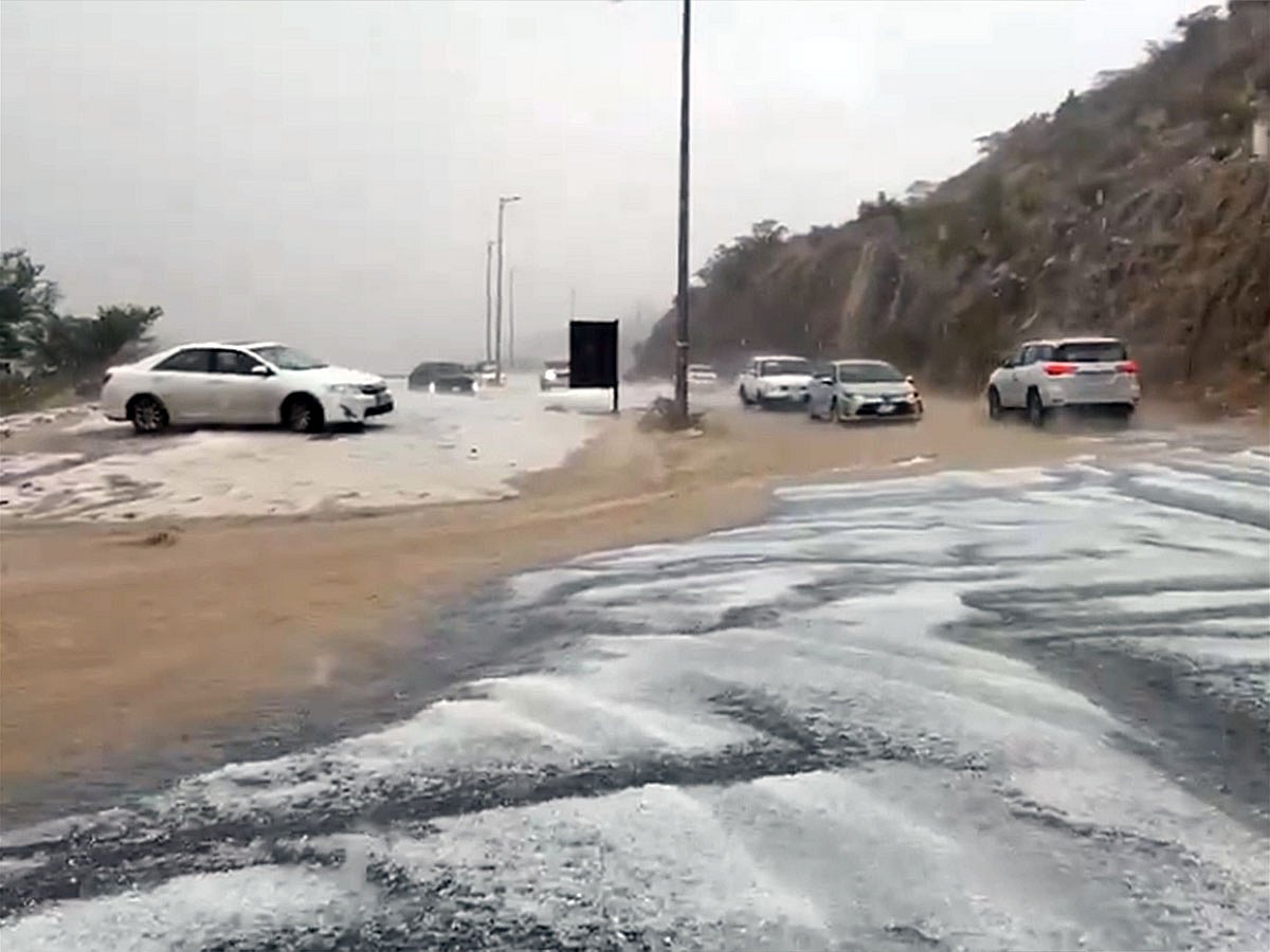 Unseasonal rain, hail sweep across southern Saudi Arabia, trigger flood ...