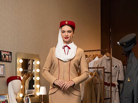 Emirates' cabin crew outfits have always been fashionable. Here's a ...
