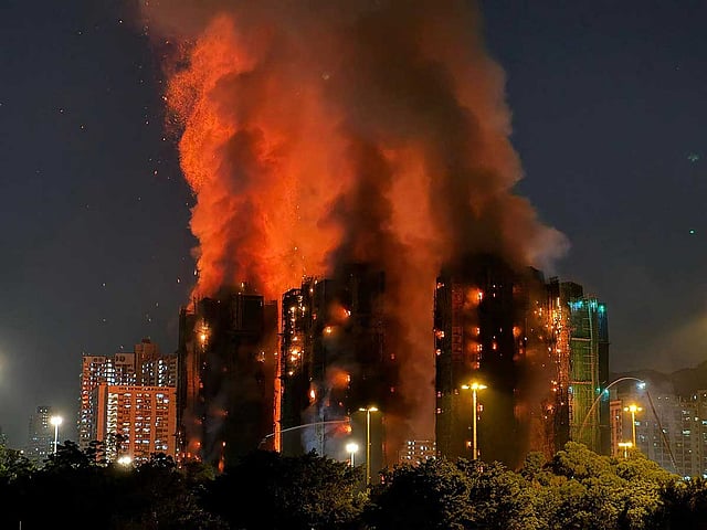 13 dead as massive fire engulfs Hong Kong high-rise complex