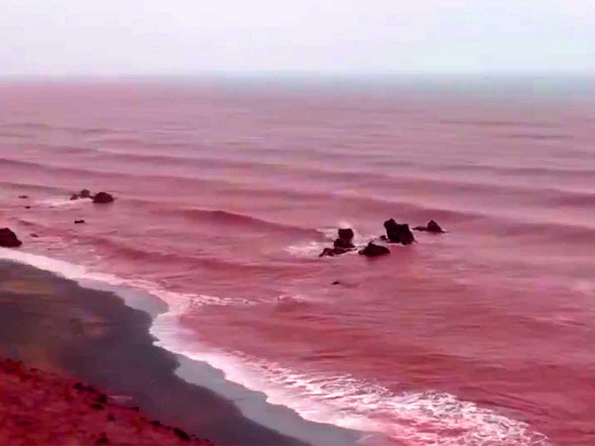 Crimson Tide: Rain Turns Iran's Hormuz Island Seas Bright Red