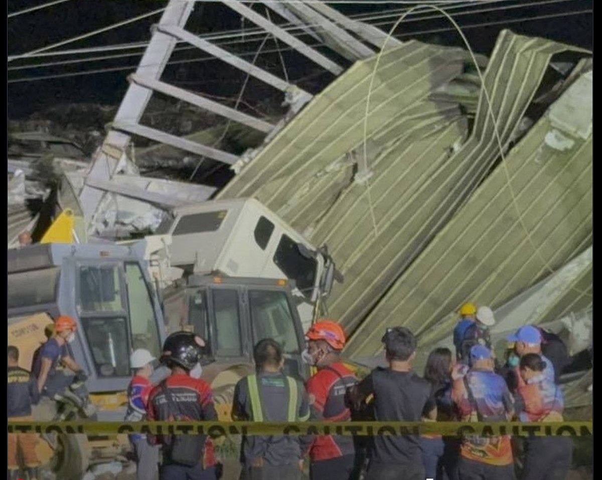 One dead, 38 missing after Philippine dump site collapse