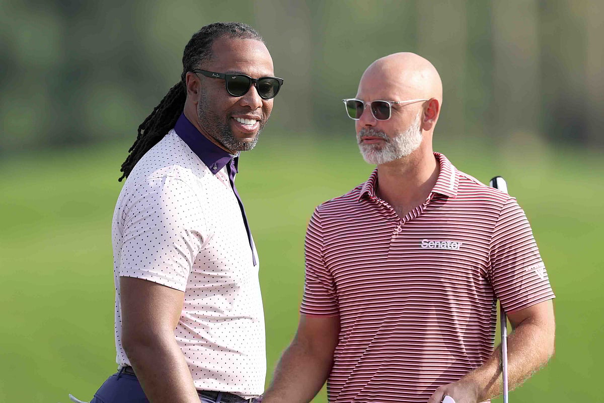 NFL legend Fitzgerald benefits from Harrington swing tips at Dubai ...