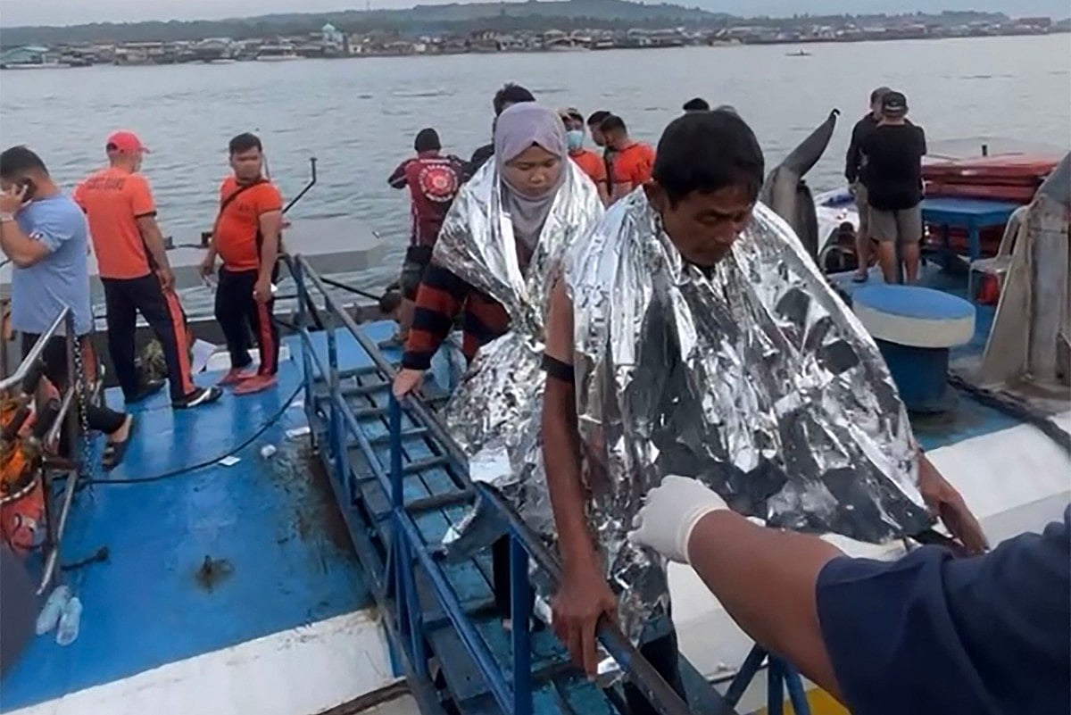 Tragedy at sea: 28 still missing as ferry sinks off southern ...