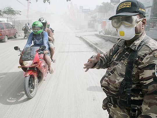 Chaotic evacuation after Indonesian volcano erupts again