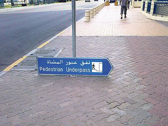 Authorities need to fix fallen sign