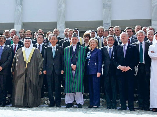 Summit backs Karzai security takeover plan