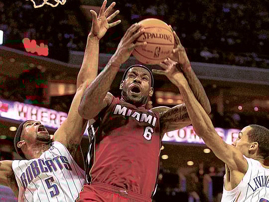 James tames the Bobcats as the Heat keep rolling along