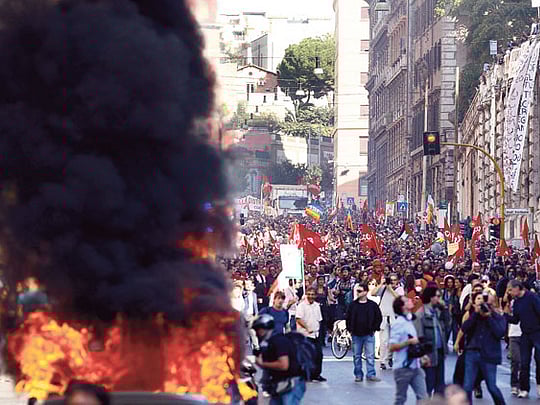 Riots in Rome, scuffles in UK mar mass protests
