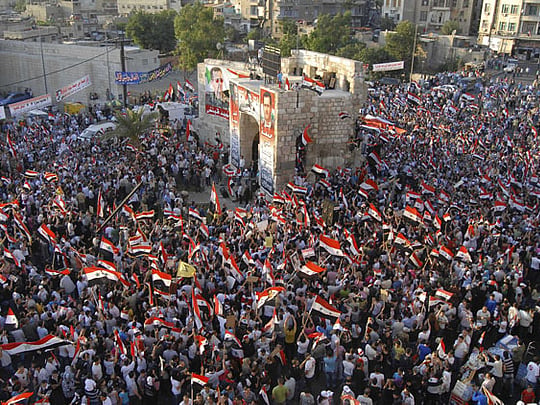 Syrian tanks deploy at Hama after large protest