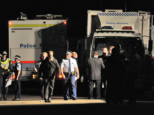 Australia police try to defuse bomb strapped to teen