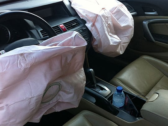 Woman suffers burns after airbag deployment