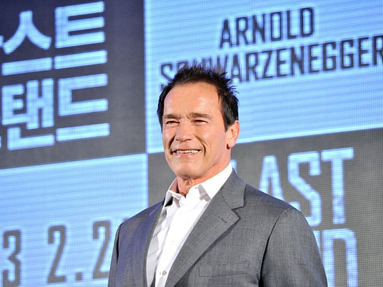 Arnie returns to bodybuilding roots