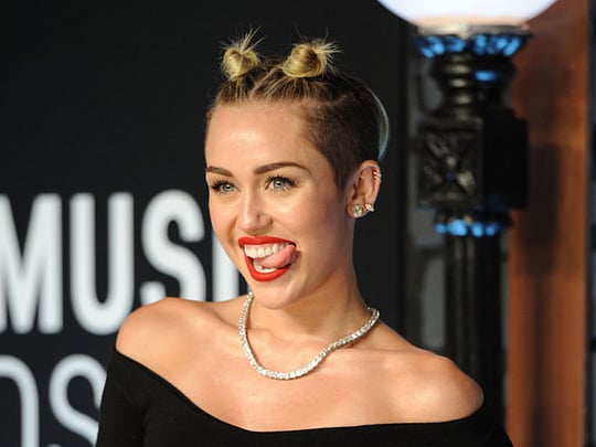 Rap stars embrace Miley Cyrus
